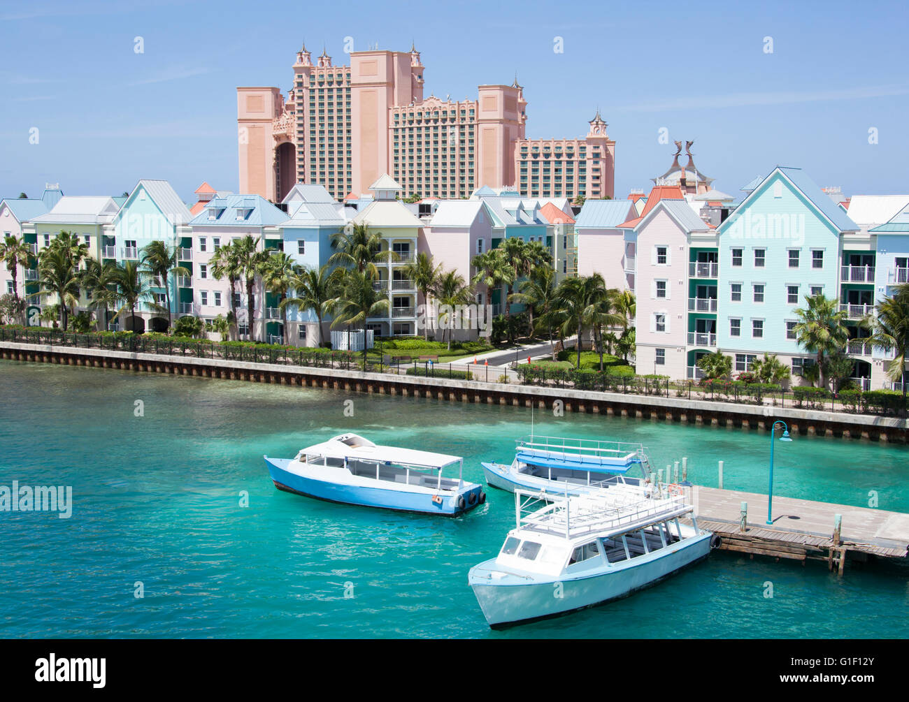 A small pier for water taxi on Paradise Island (The Bahamas Stock Photo ...