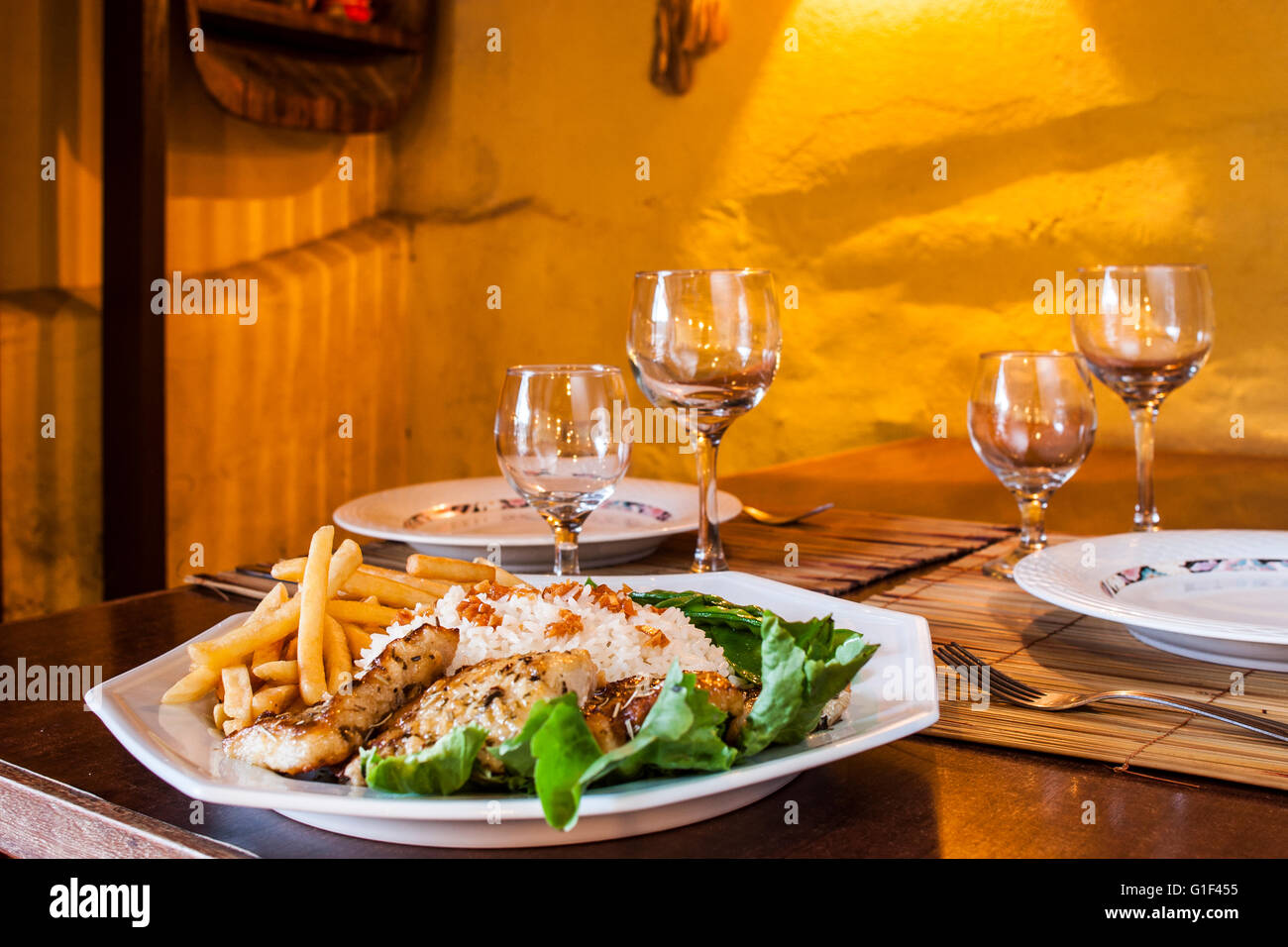 Grilled fish served french fries hi-res stock photography and images ...