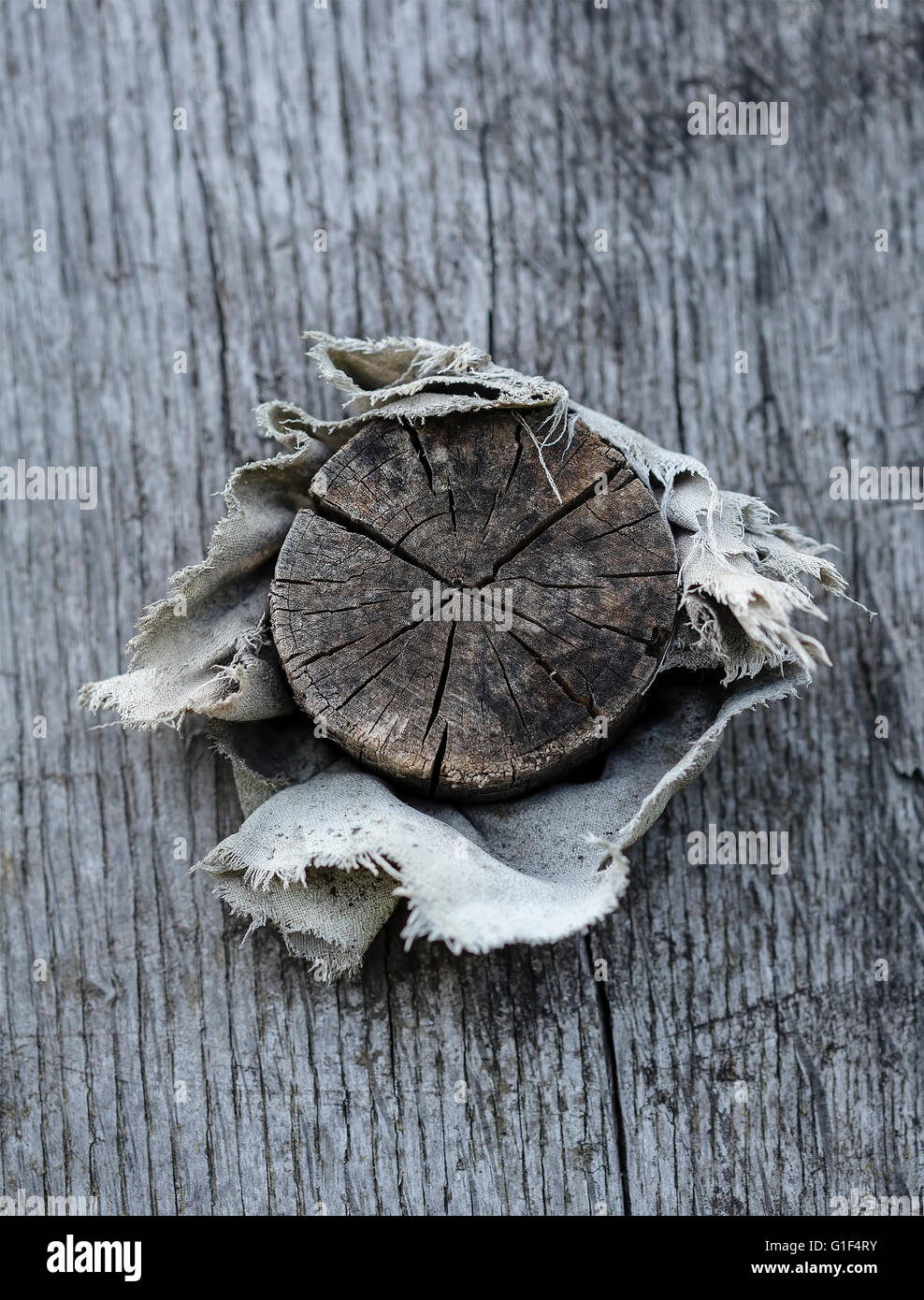 Old fashioned wooden plug with textile cloth Stock Photo - Alamy