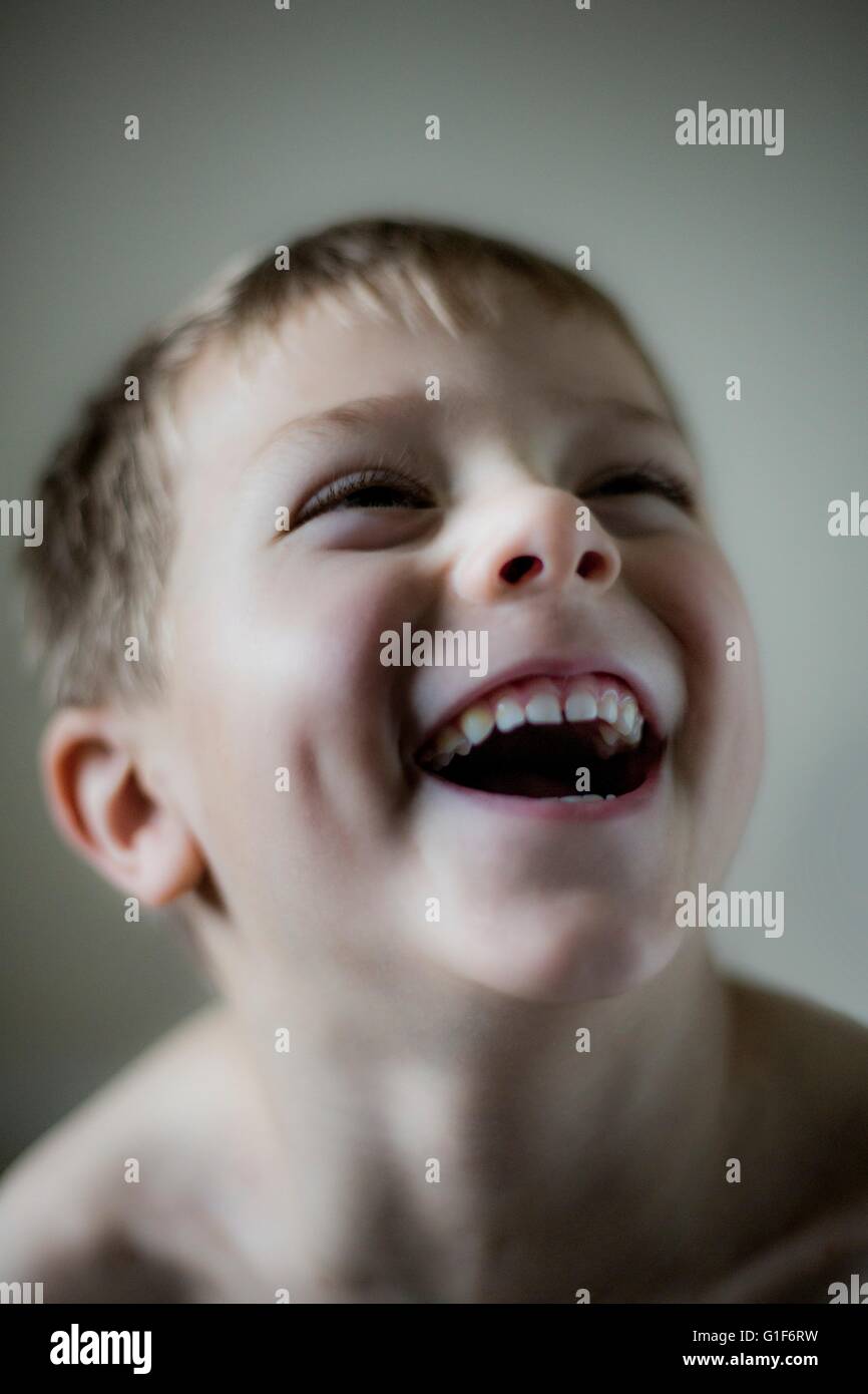 Boy laughing hi-res stock photography and images - Alamy
