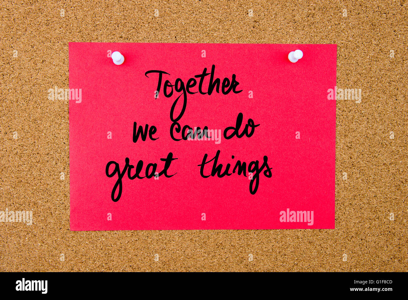 Red paper note with handwritten text Together We Can Do Great Things ...