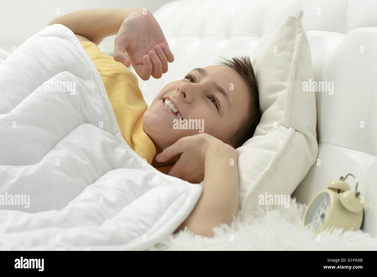 cute waking up boy Stock Photo - Alamy