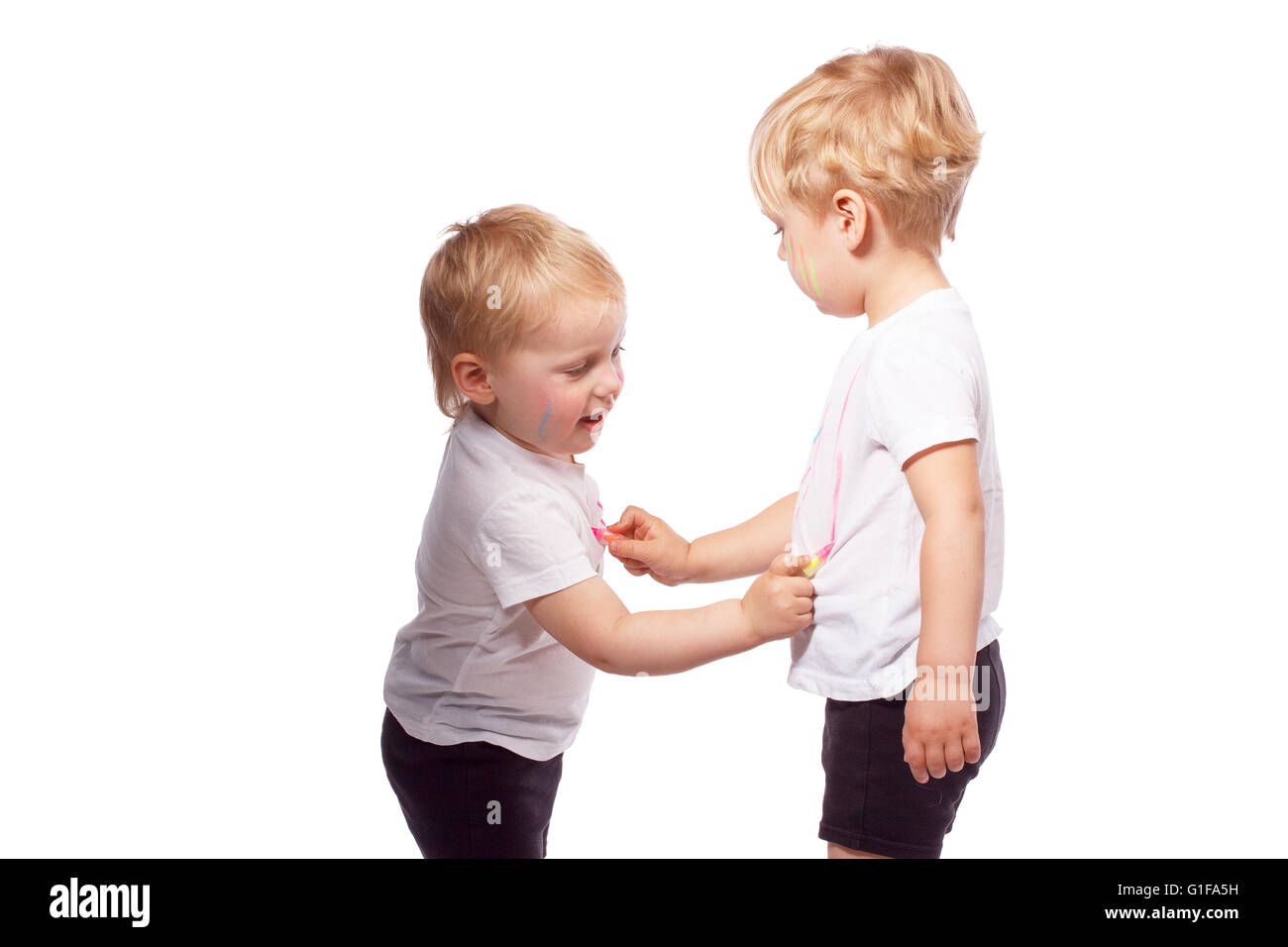 Children draw colored chalk on each other. Isolated on white Stock ...