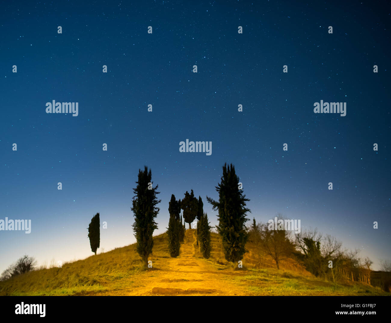 Starry night on the hill in Italy Stock Photo - Alamy