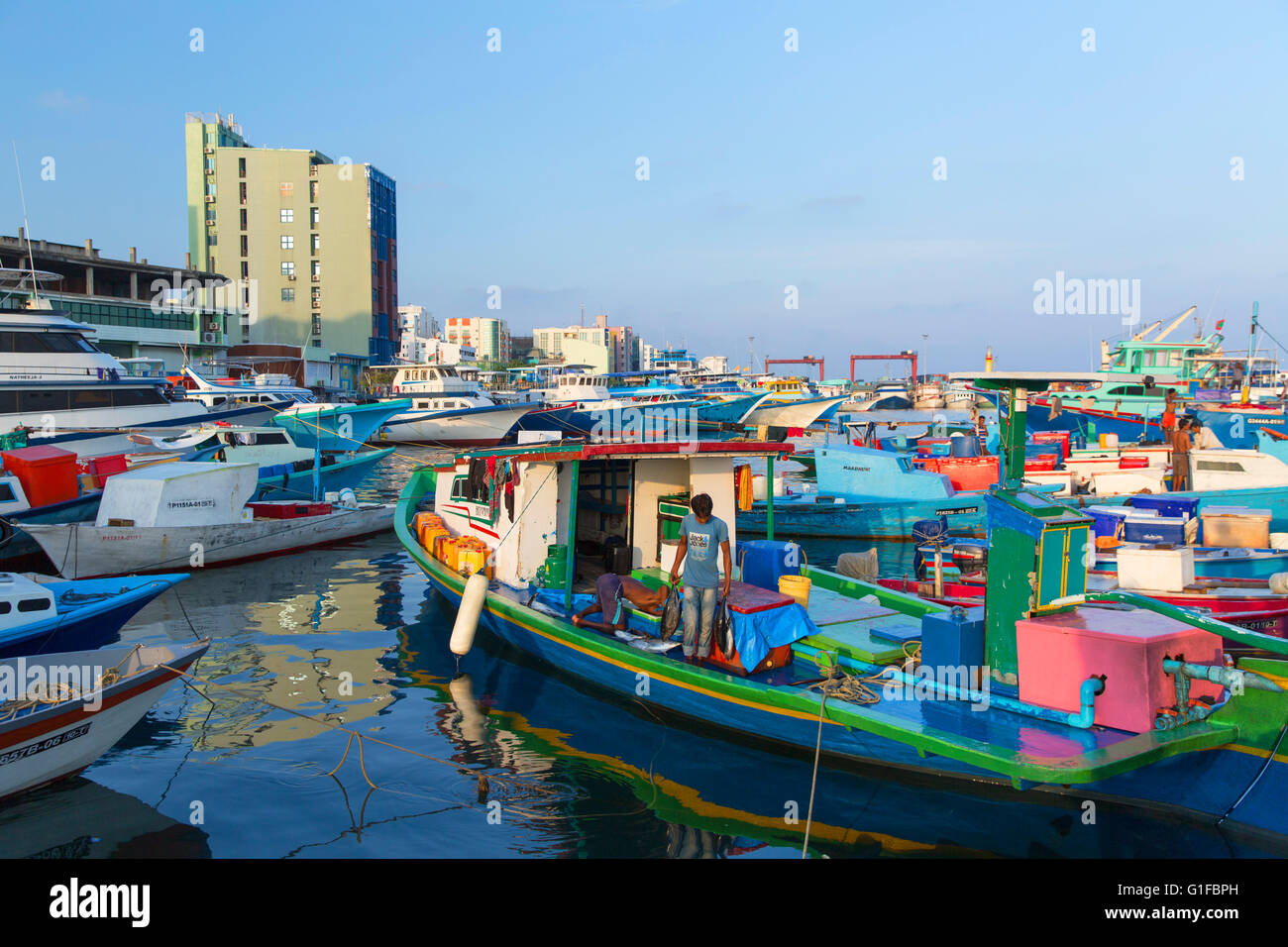 Fishing boats in harbour, Male, North Male Atoll, Maldives Stock Photo ...