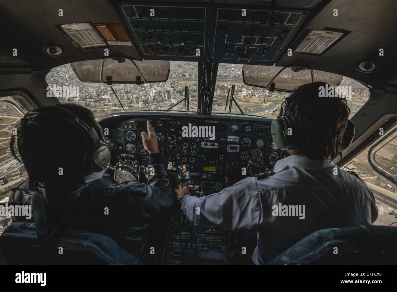 The Cockpit view whilst flying in a small aircraft from Lukla airport ...