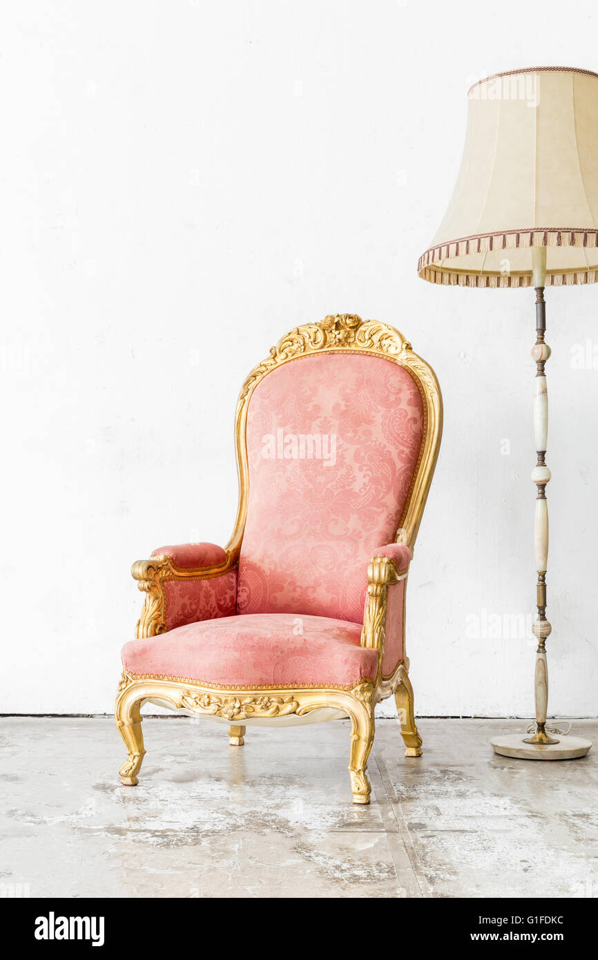 Pink Vintage retro style Chair with lamp Stock Photo - Alamy