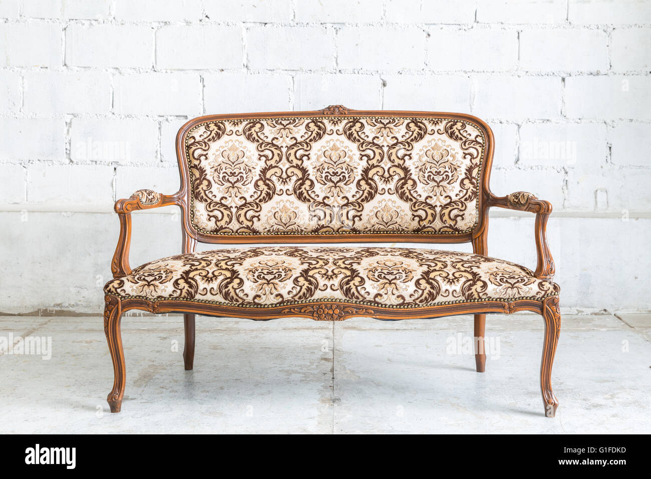 Brown Classical style sofa couch in vintage room Stock Photo - Alamy