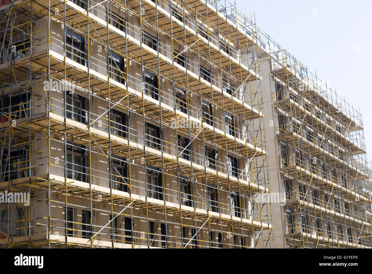 building supported by Scaffolding Stock Photo - Alamy