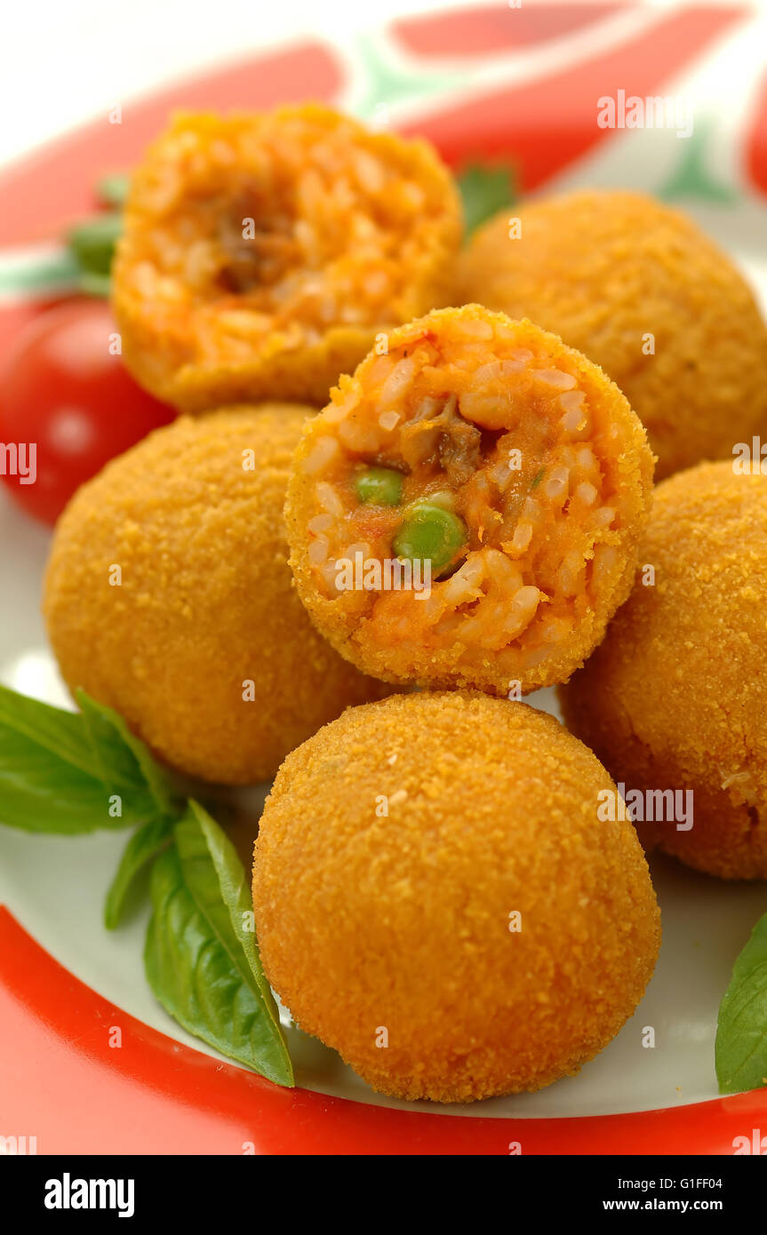 Arancini - traditional Italian fried rice Stock Photo - Alamy