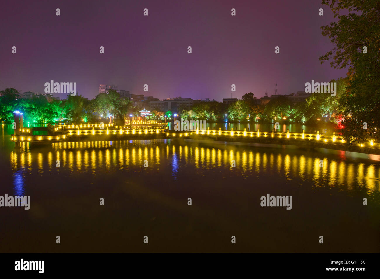Bridge reflection on Banyan Lake, Guilin, Guangxi Autonomous Region ...