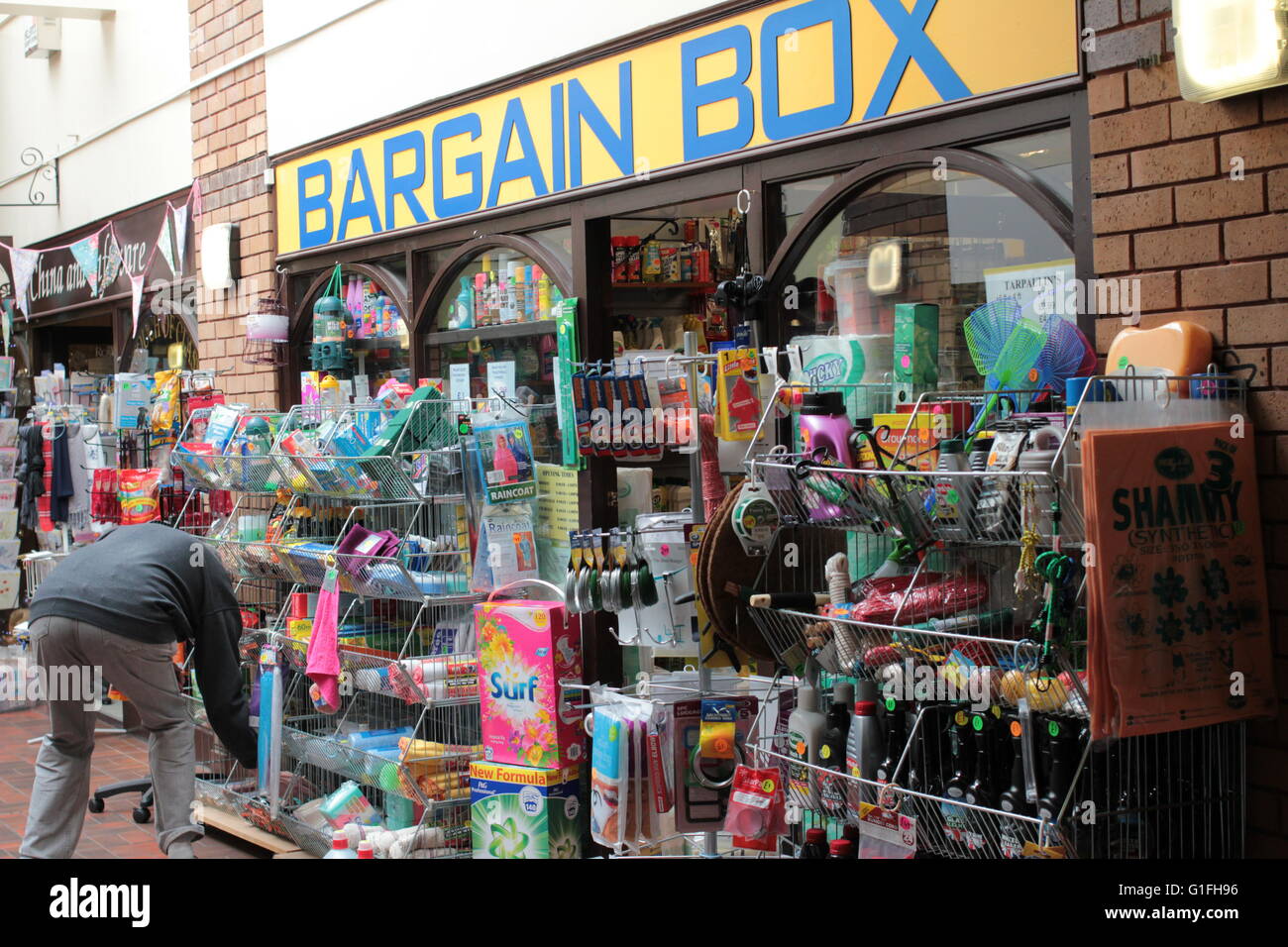 Bright shop front with multiple goods display Stock Photo - Alamy