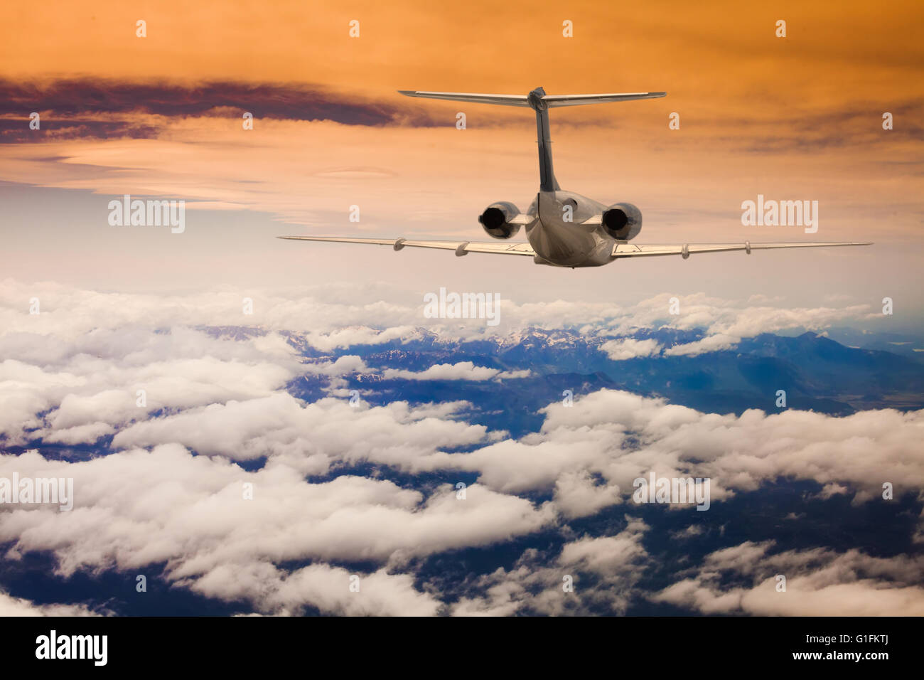 Flying an airplane in morning sun Stock Photo - Alamy