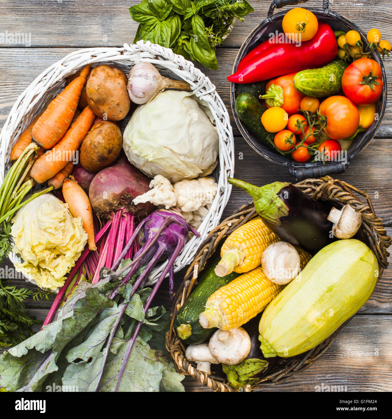 Vegetables on wooden table Stock Photo - Alamy