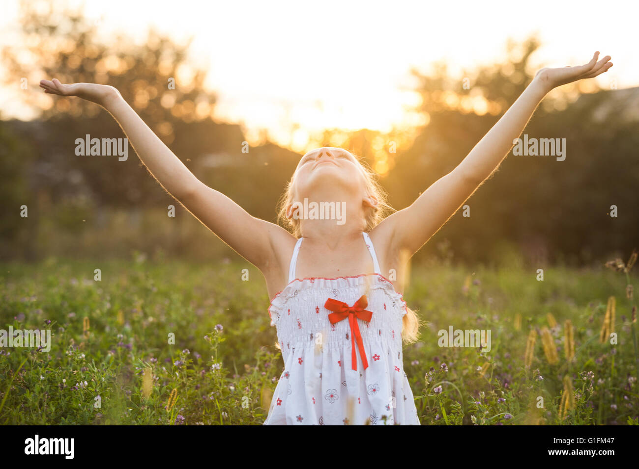 Happy little girl Stock Photo - Alamy