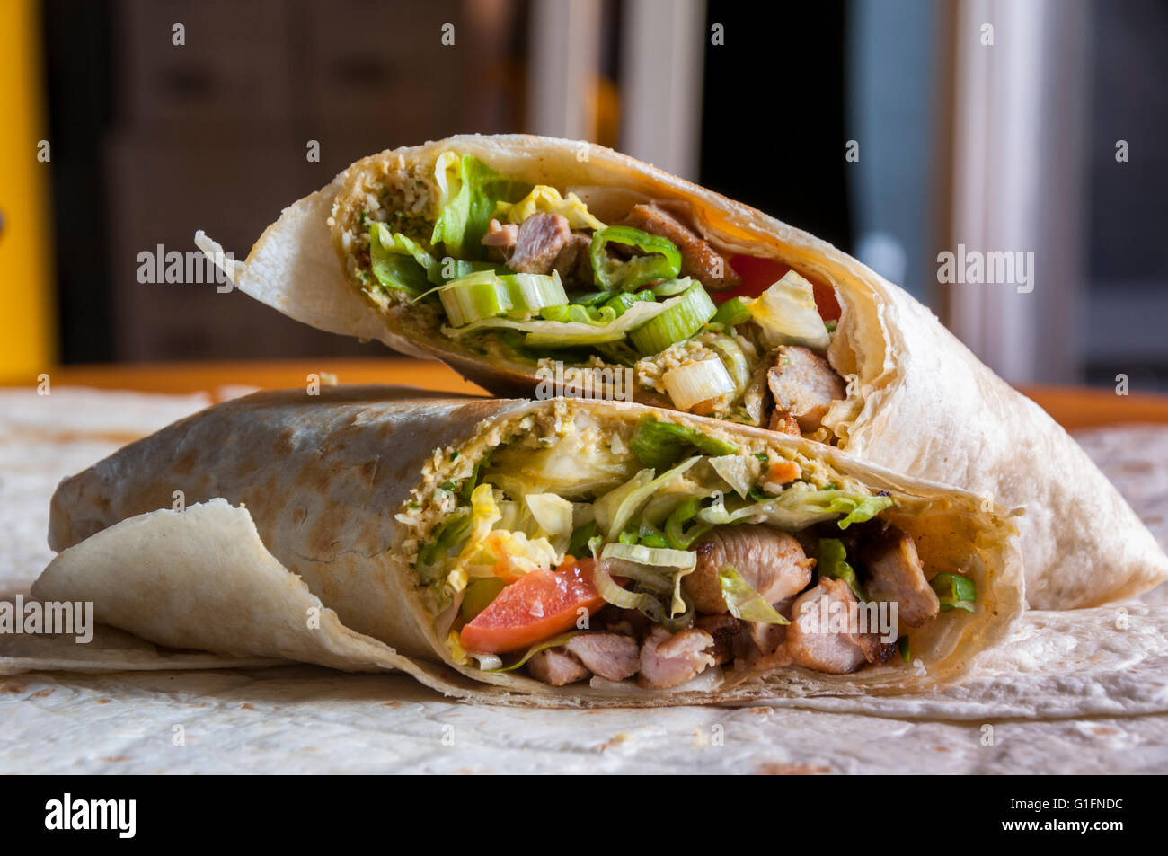 Tasty indian wrap with chicken meat and garam masala spices Stock Photo ...