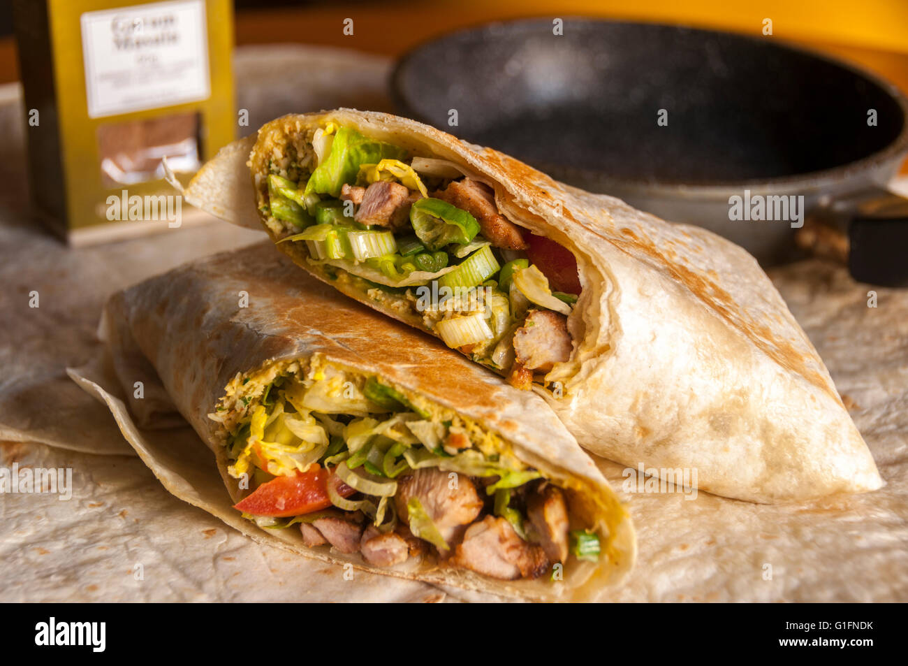 Tasty indian wrap with chicken meat and garam masala spices Stock Photo ...