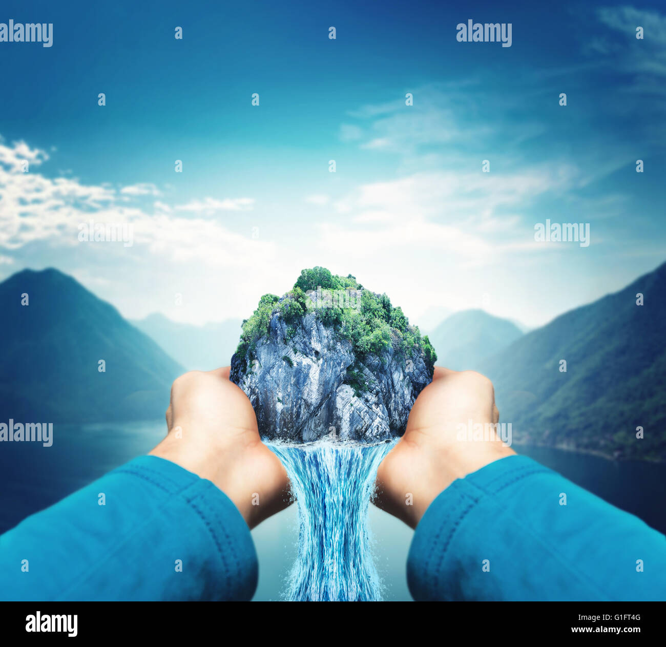 Male hands with waterfall Stock Photo - Alamy