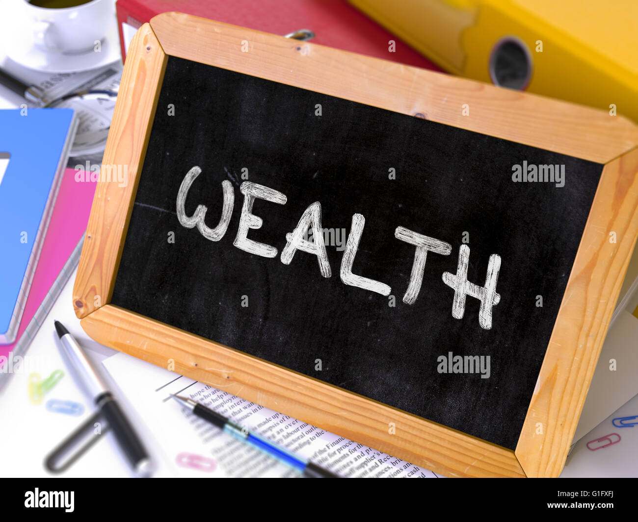 Wealth Handwritten by White Chalk on a Blackboard Stock Photo - Alamy