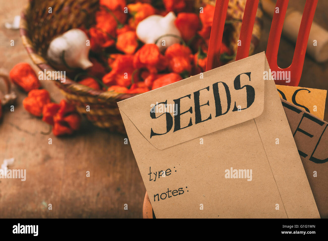 Garden table with seeds envelopes Stock Photo - Alamy