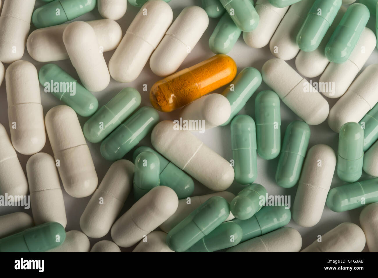 Stack of different pills Stock Photo - Alamy
