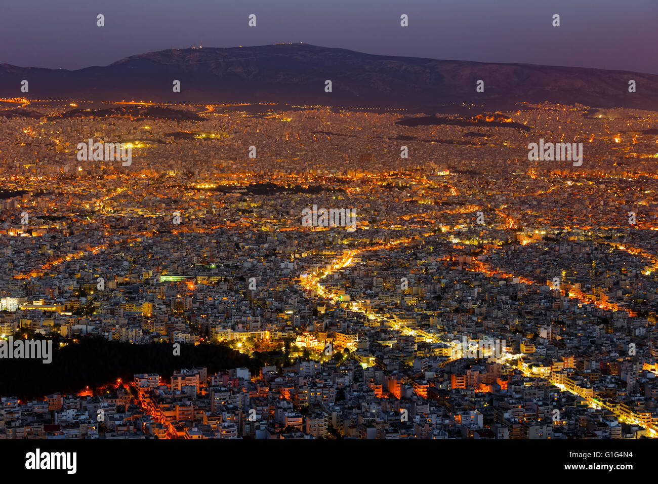 Athens skyline view after sunset with vivid street lights in Greece ...