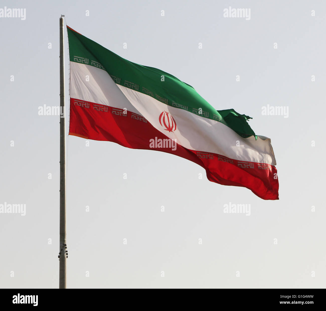 Iran flag on flag pole hi-res stock photography and images - Alamy