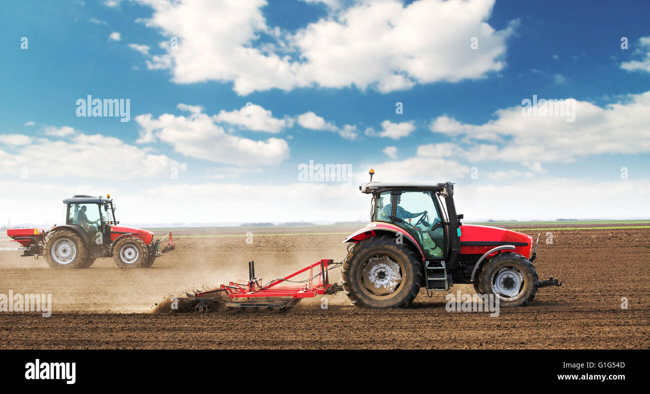 Farmers preparing land and fertilising Stock Photo - Alamy