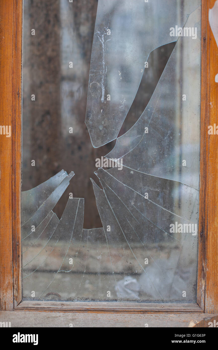 Damage from impact stone or bullets Stock Photo - Alamy