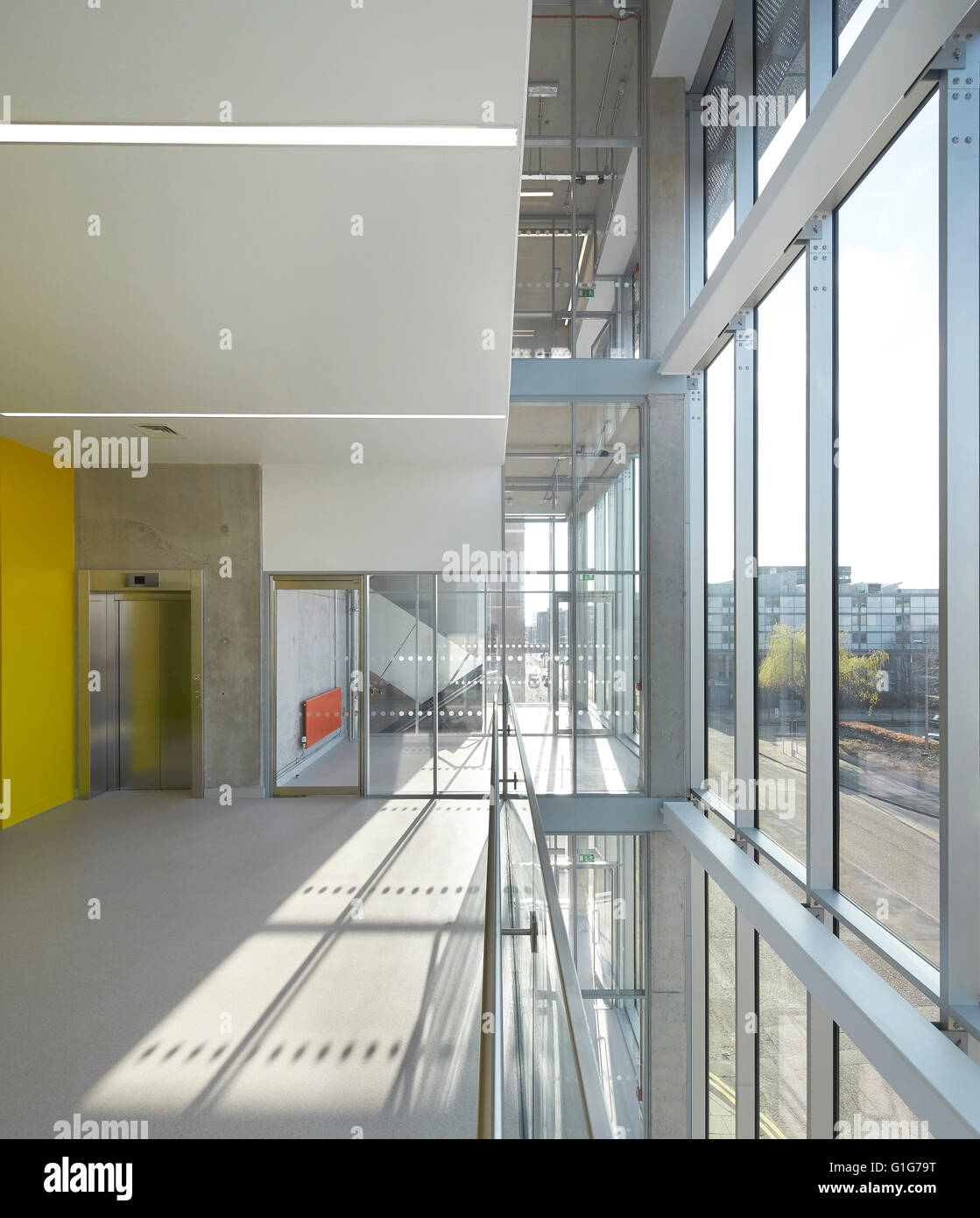 Upper floor corridor with window wall. Graphene Institute, University ...