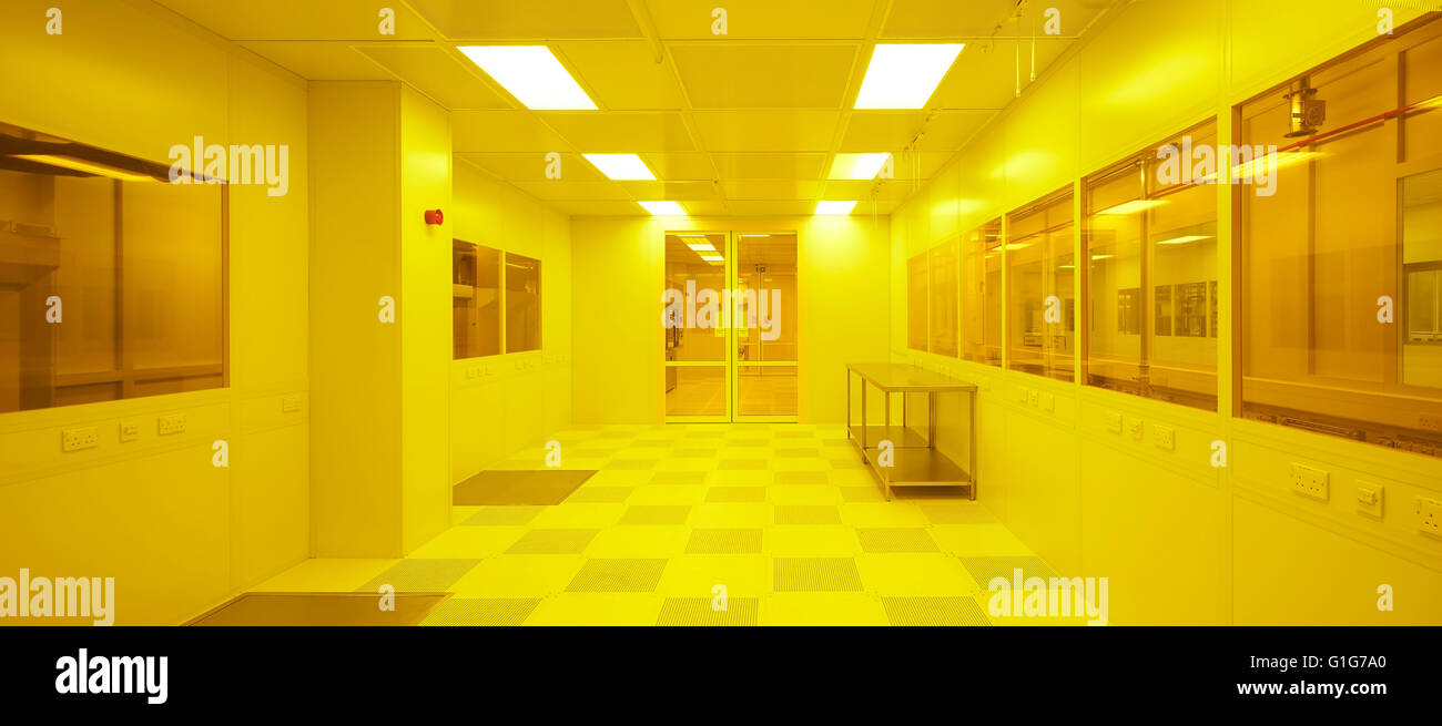 Basement lab corridor doused in yellow light. Graphene Institute ...
