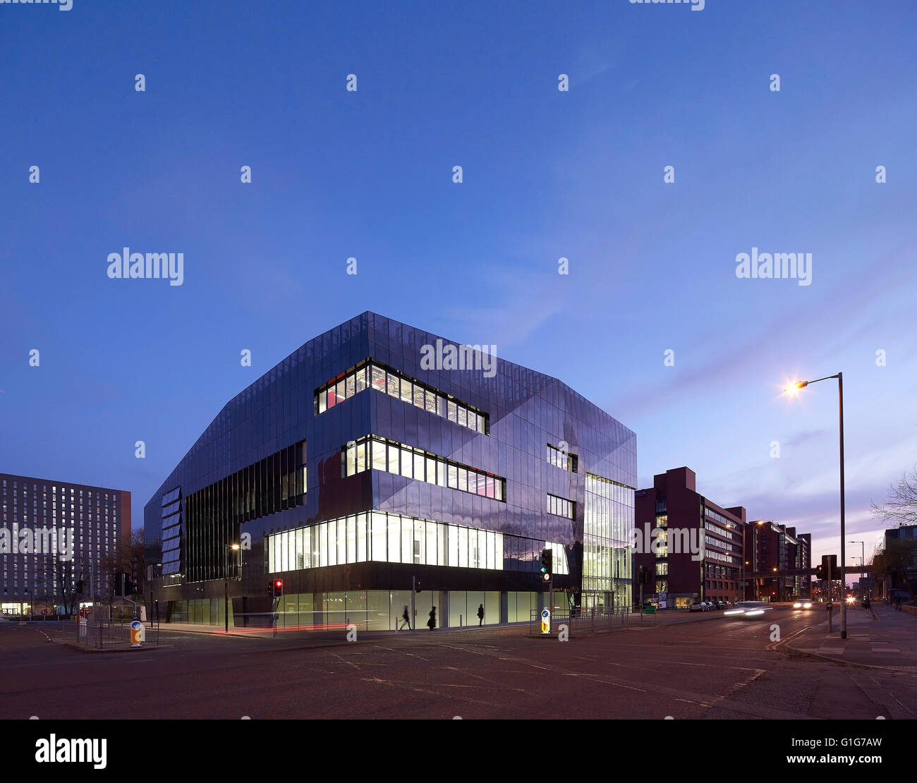 Corner elevation with streetscape at dusk. Graphene Institute ...