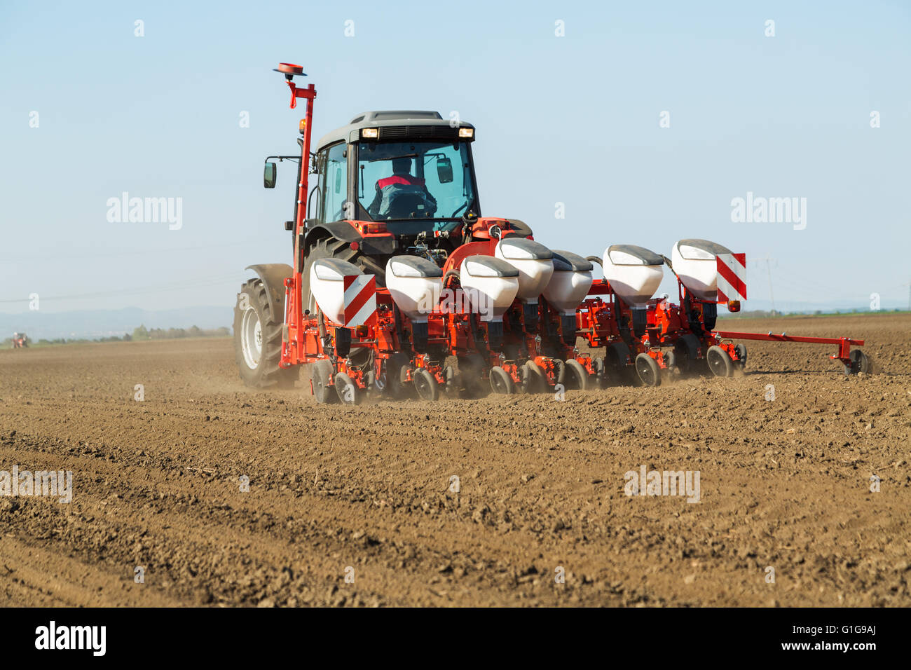 Farmer seeding crops Stock Photo - Alamy