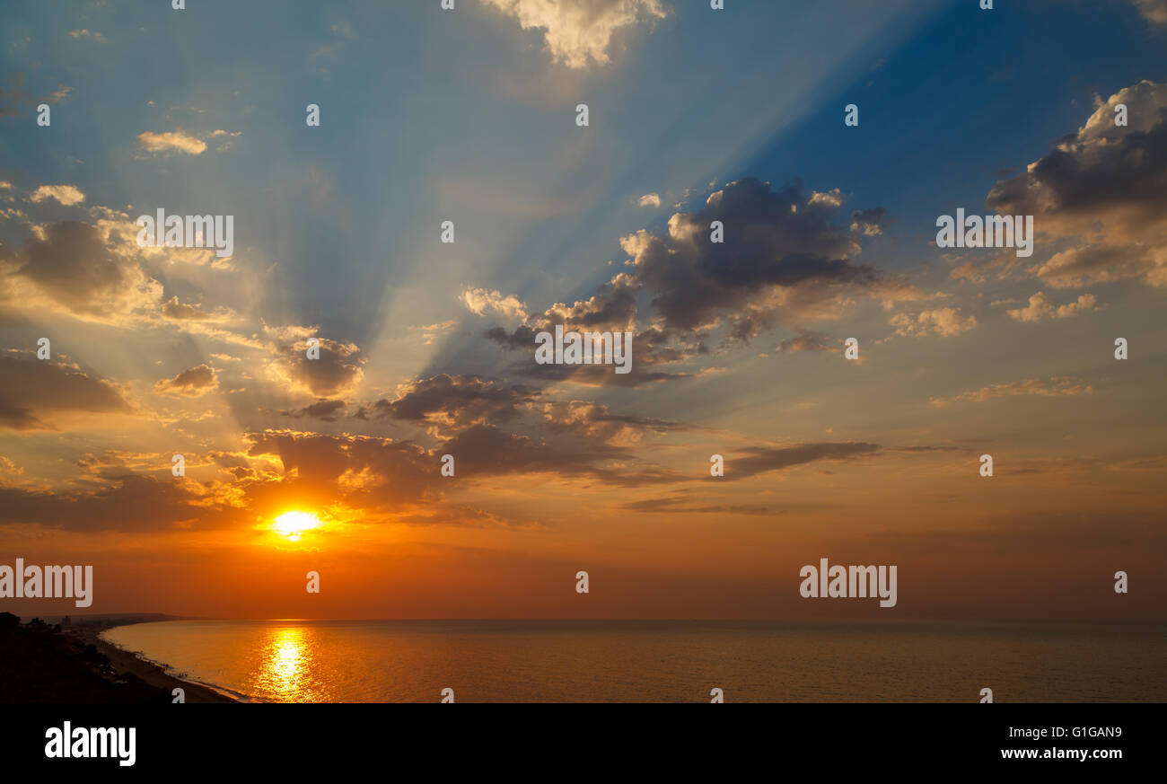 Fabulous sunset on the beach in the quiet summer weather Stock Photo ...