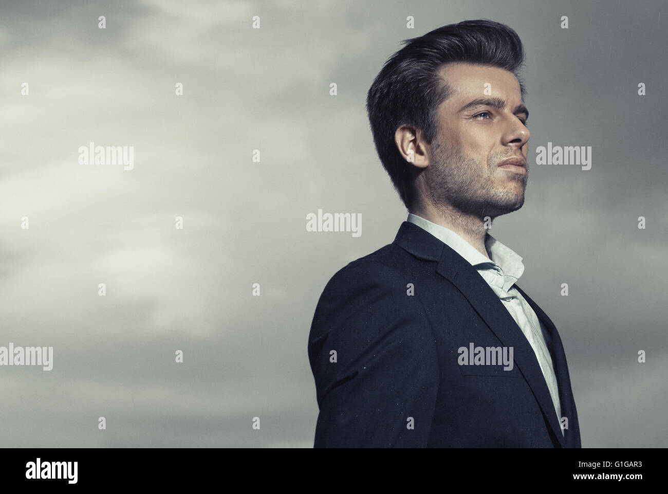 Portrait of the serious handsome man Stock Photo - Alamy