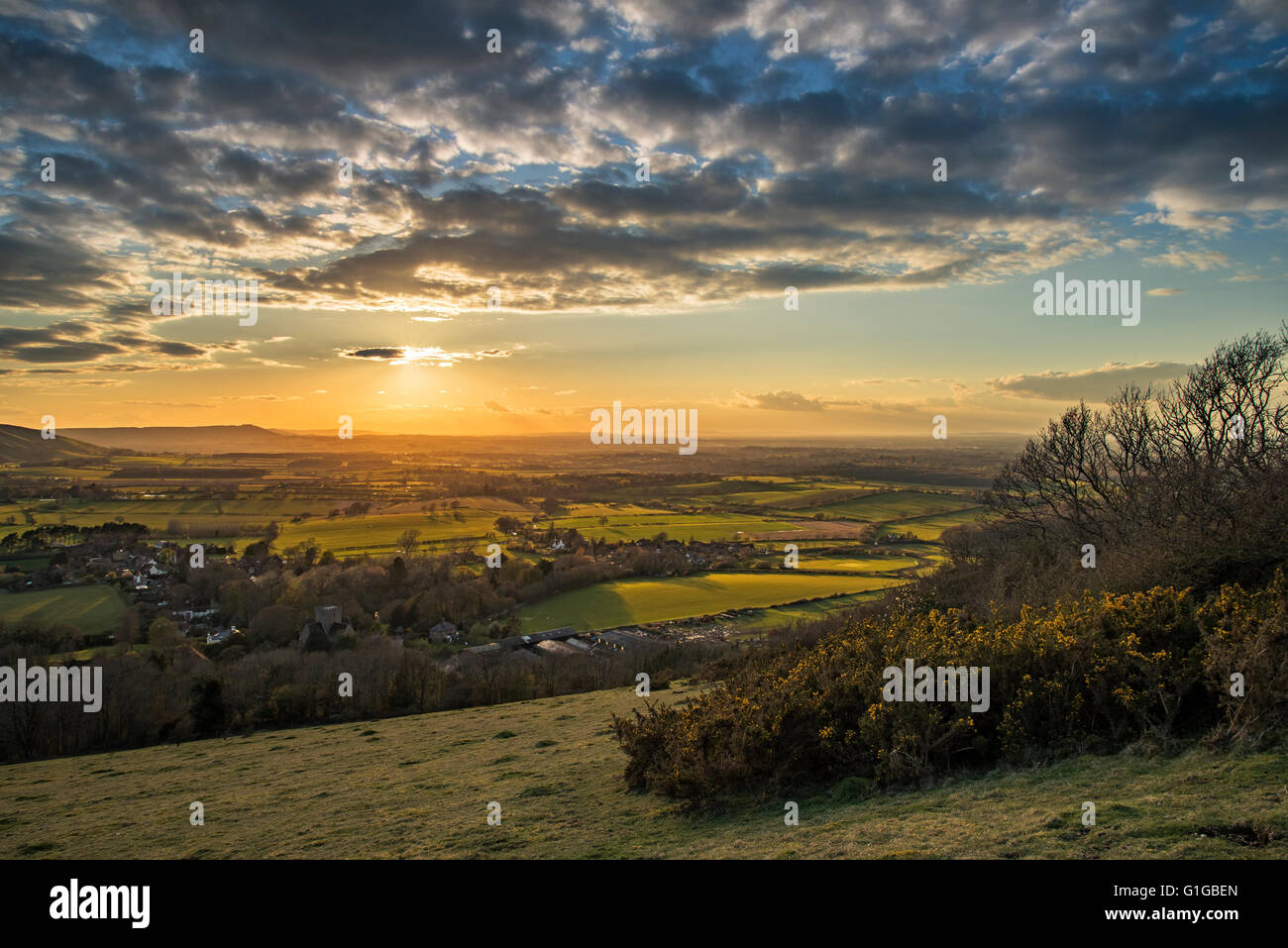 Stunning landscape image of sunset over countryside landscape in ...