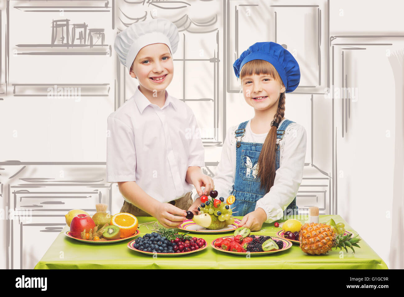 Children making fruit snacks Stock Photo - Alamy