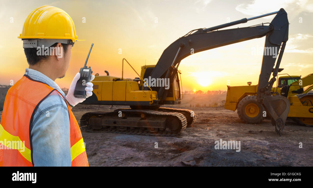 Confident supervisor using walkie talkie construction hi-res stock ...