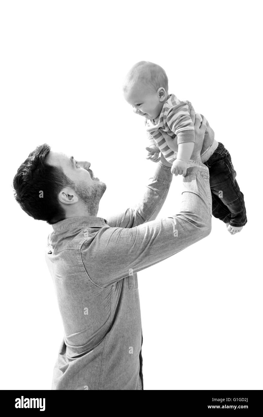 Father raise his new born baby boy on his hands on white Stock Photo ...
