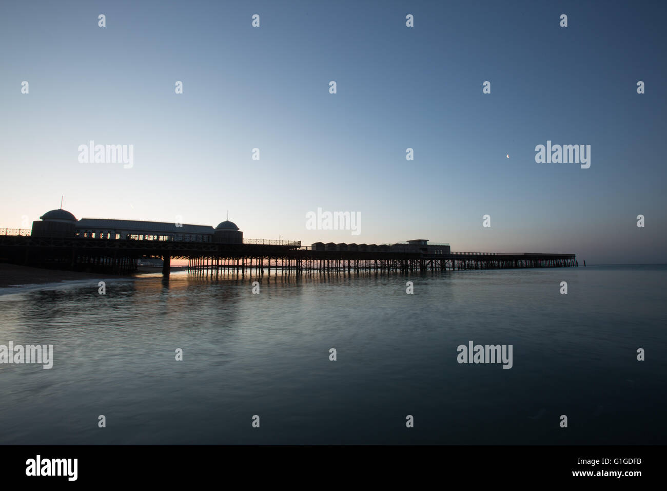 Hastings pier at first light stretching into the distance, long ...