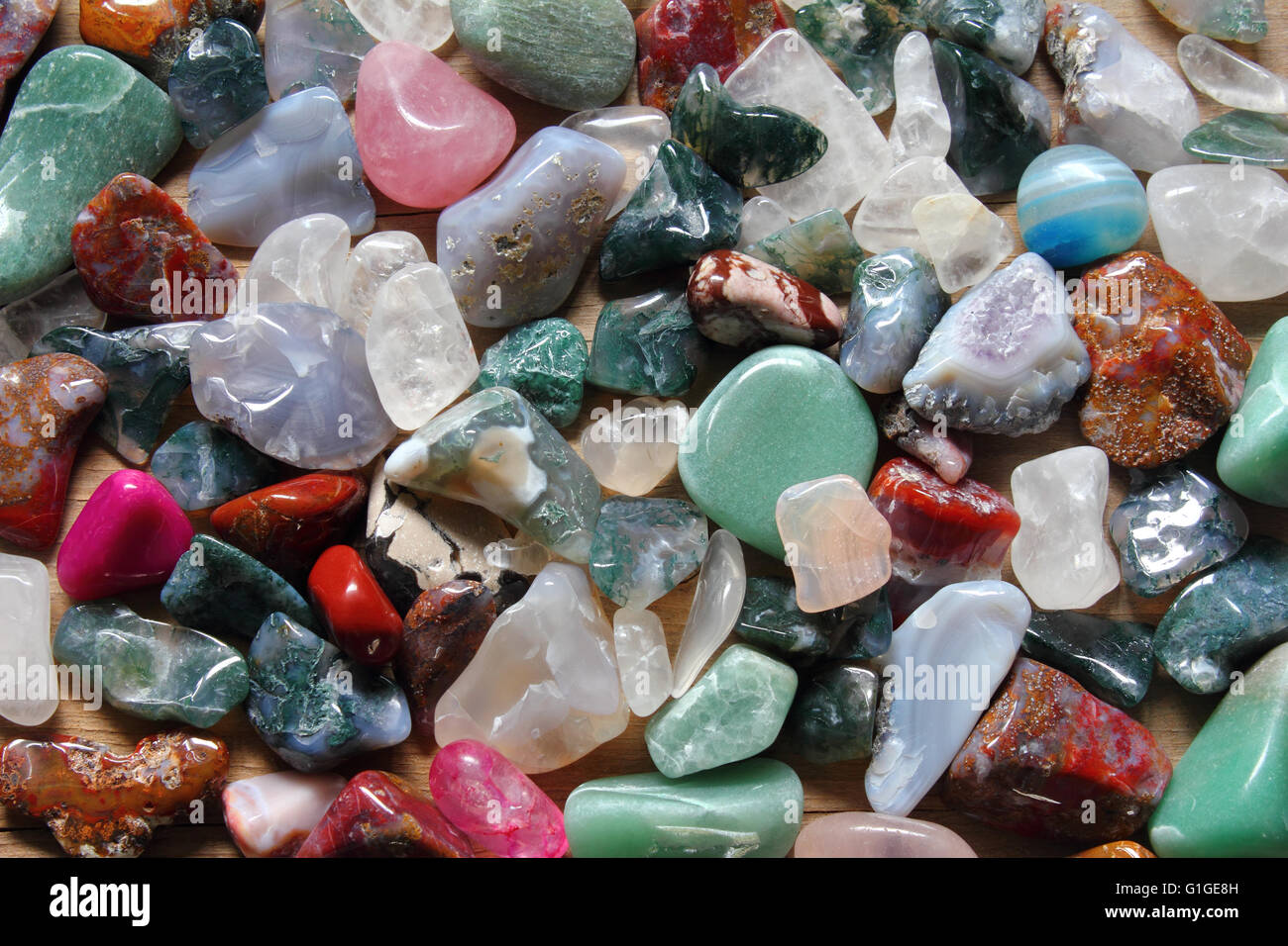 Polished rocks; including agates, quartz, red jasper, and geode Stock ...