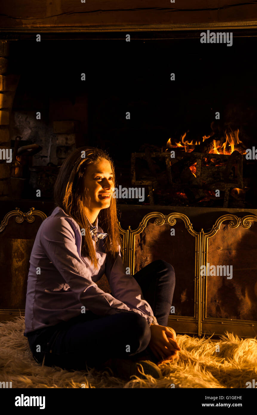 Sitting beside fire hi-res stock photography and images - Alamy