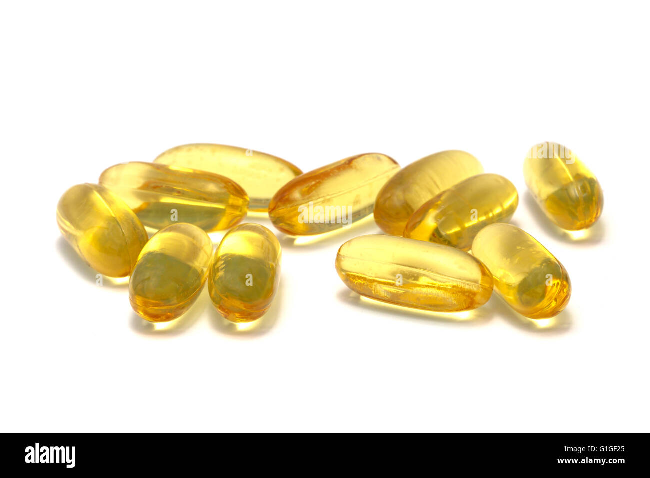 Omega 3 capsules on white background Stock Photo - Alamy