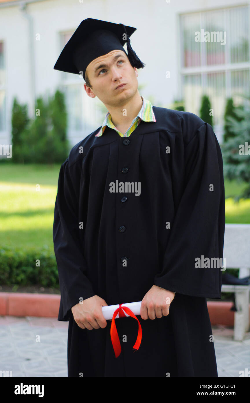 The graduate thinking about his future Stock Photo - Alamy