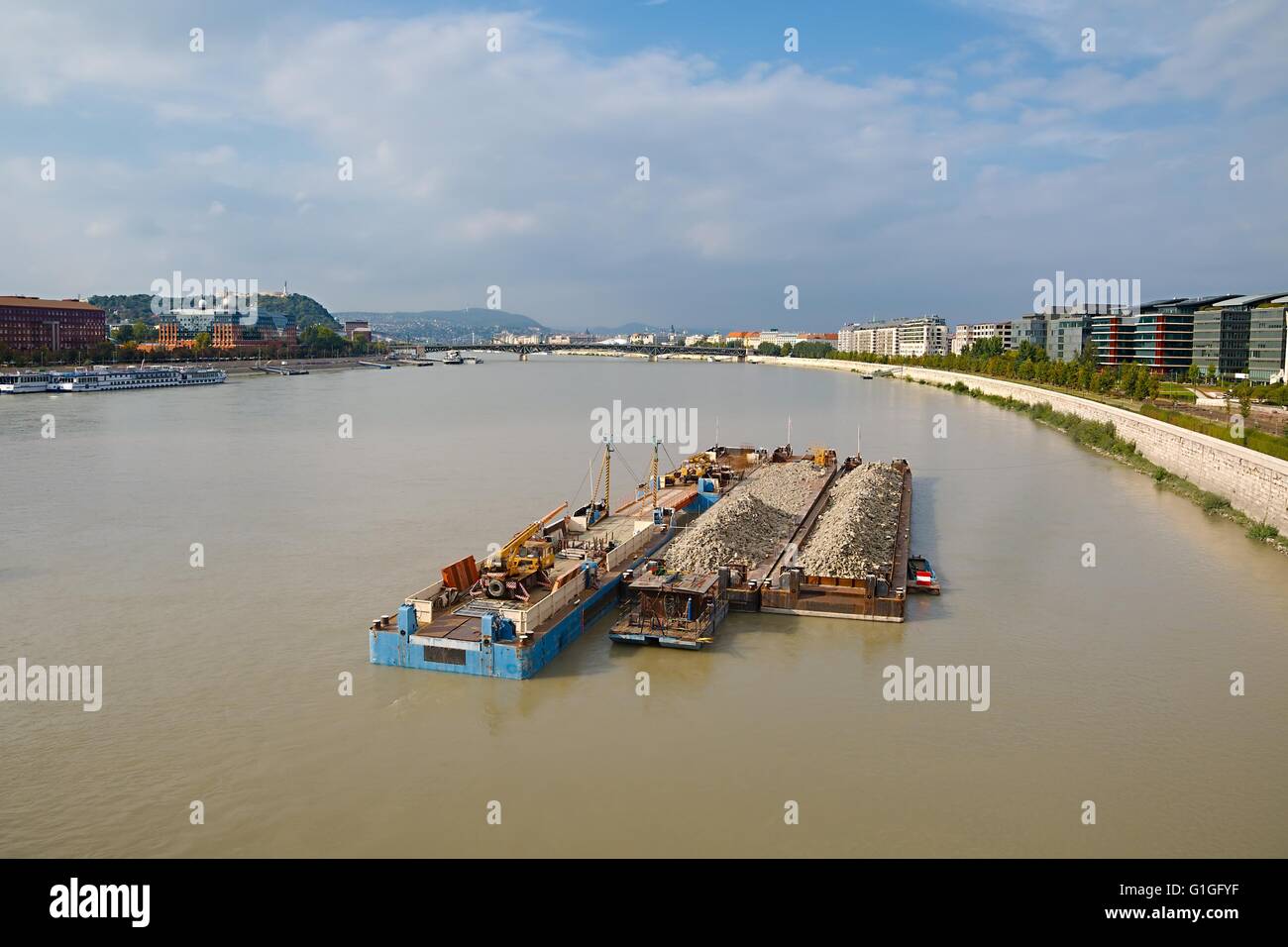 Barges with construction material Stock Photo - Alamy