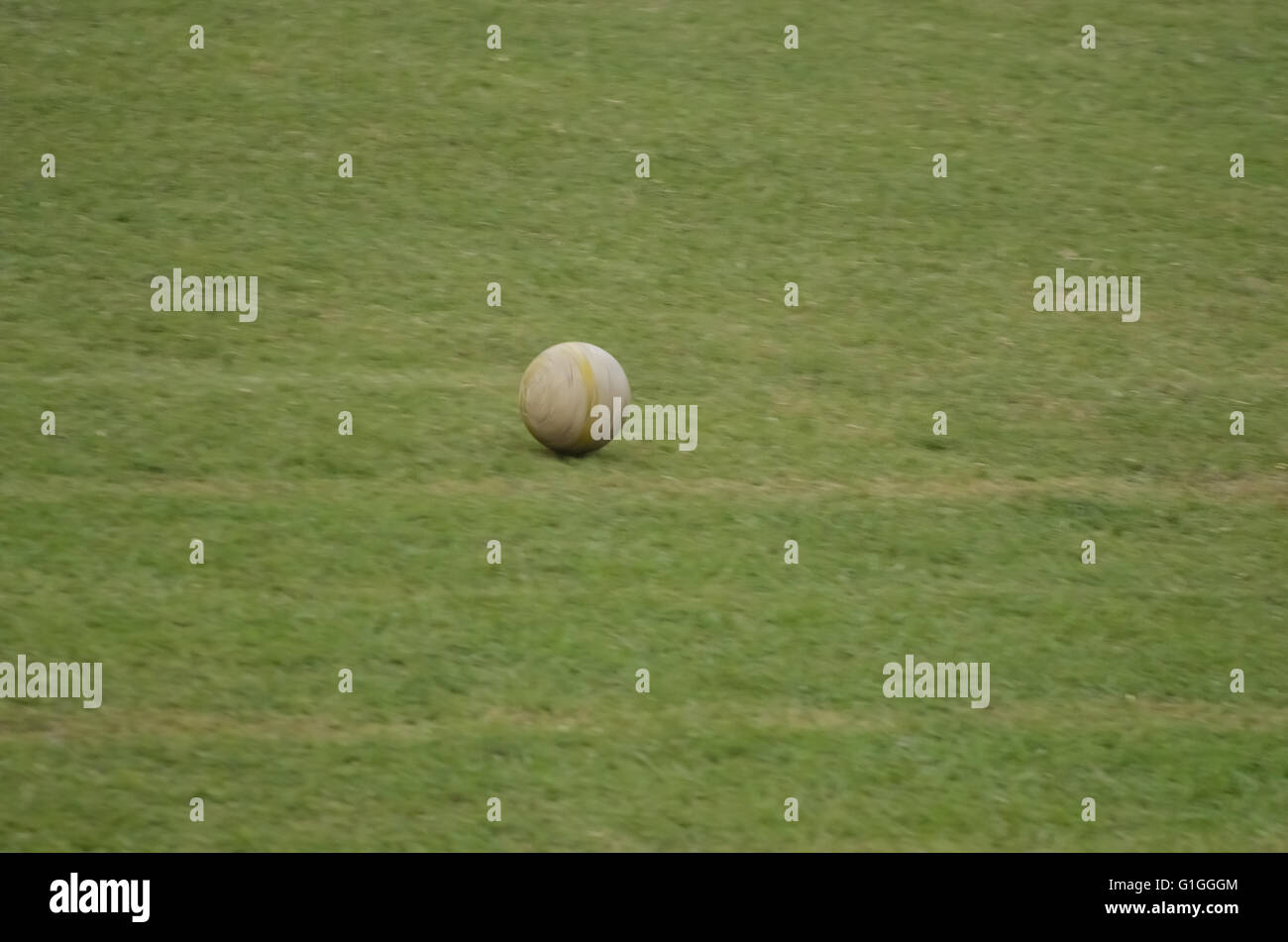 Soccer ball in empty field Stock Photo - Alamy