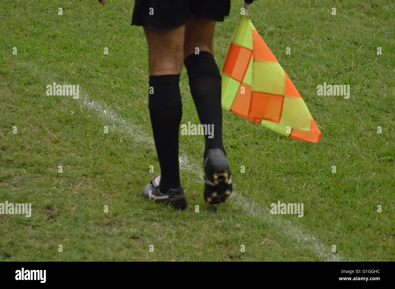 Assistant referee with his flag hi-res stock photography and images - Alamy
