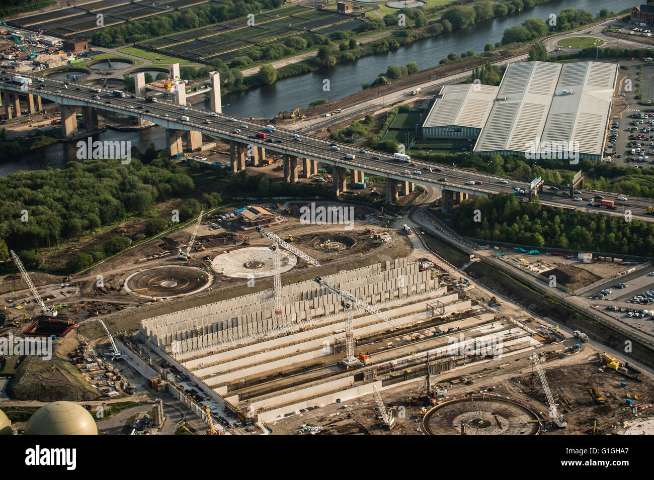 M60 bridge over Manchester Ship Canal and new development at Carrington ...