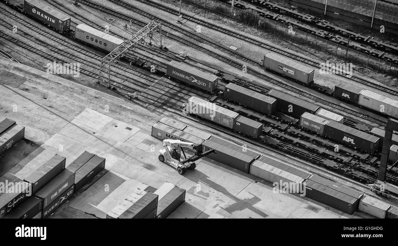 aerial photo of container depot with stacked shipping containers and ...