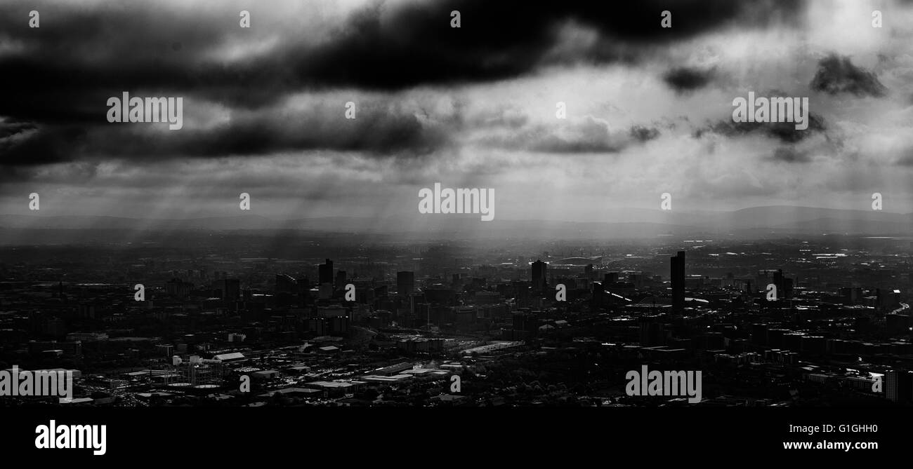Aerial photo of Manchester with sun beams through clouds Stock Photo ...